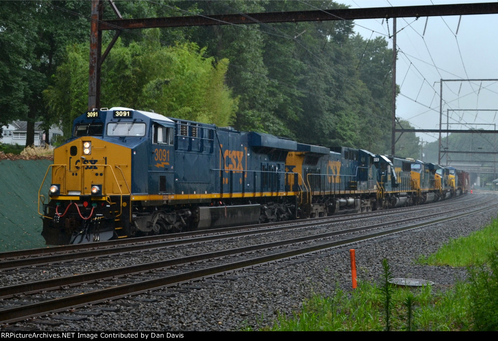 CSX ES44AH 3091 leads Q438-23